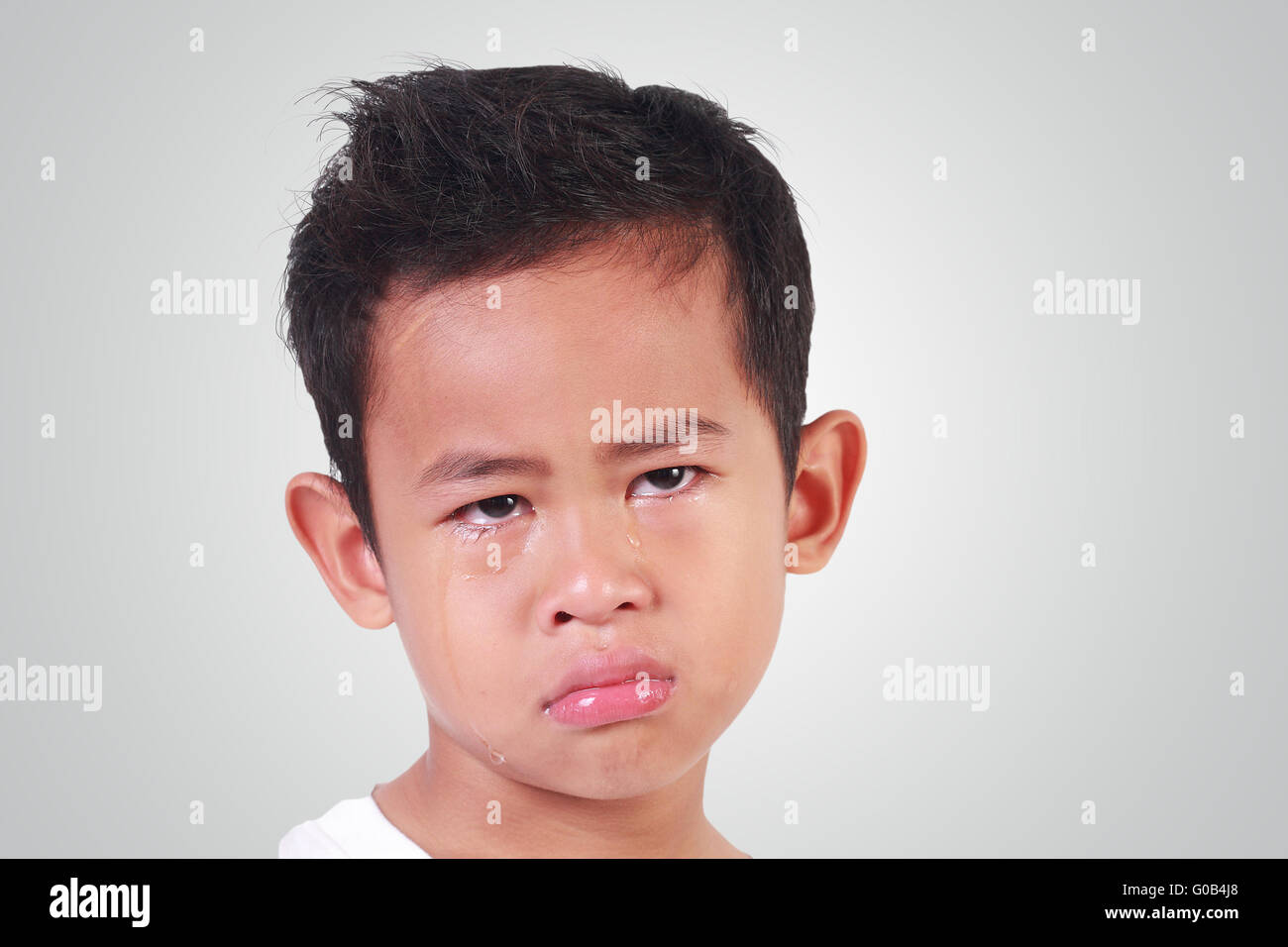 Sad asian boy hi-res stock photography and images - Alamy