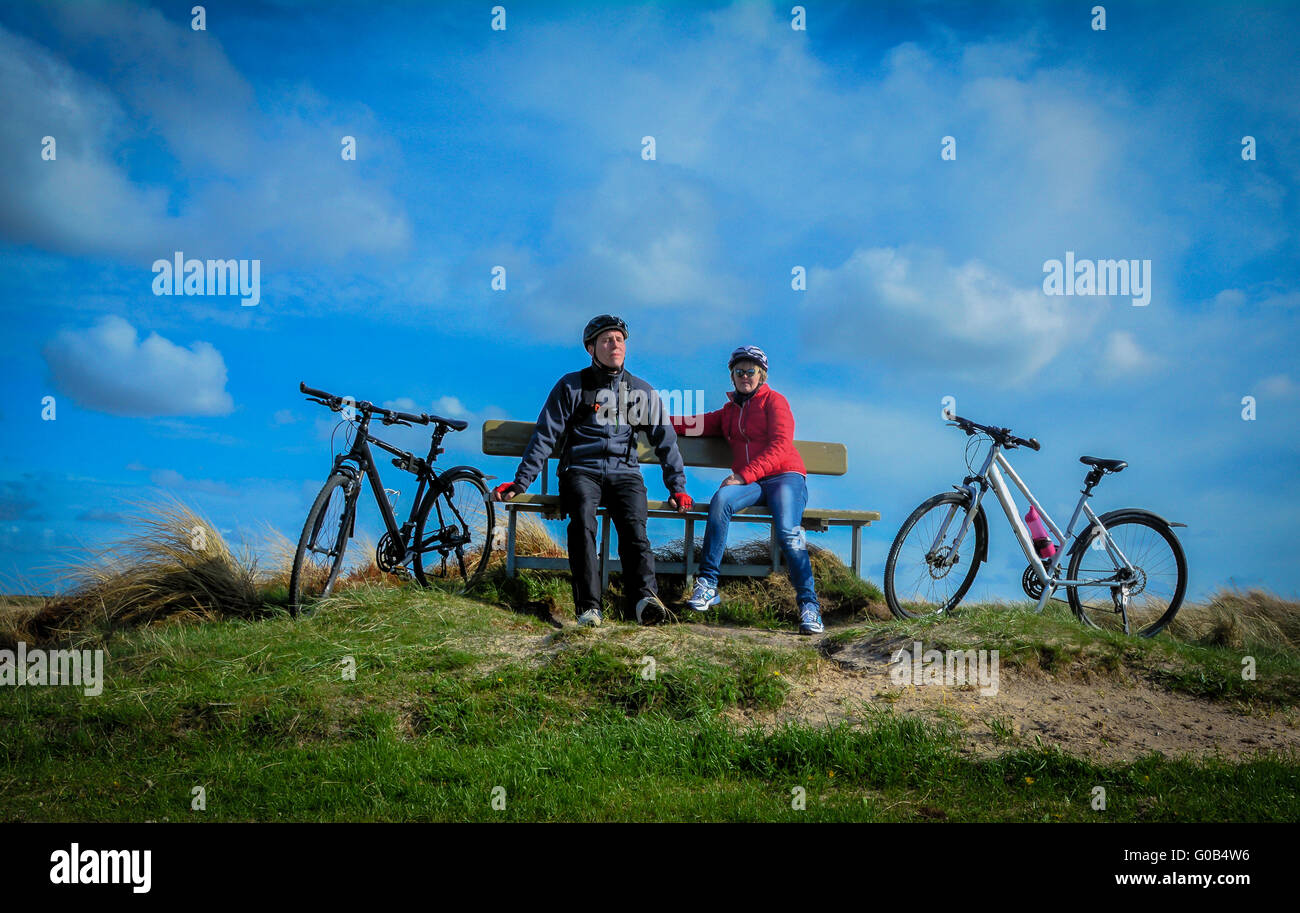 Bicyclist making a rest Stock Photo - Alamy