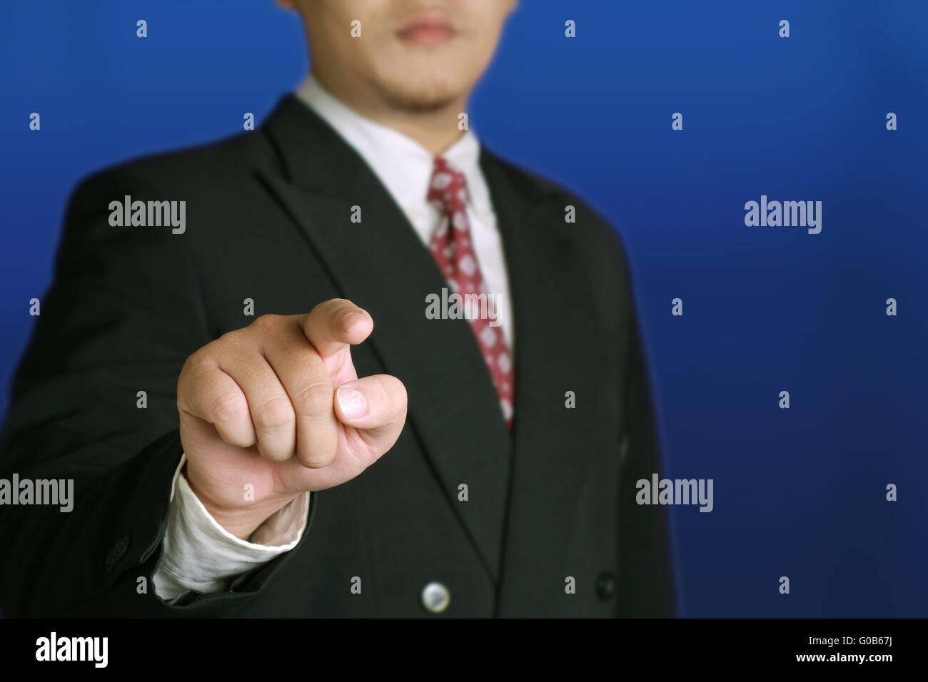 Businessman pointing to screen hi-res stock photography and images - Alamy