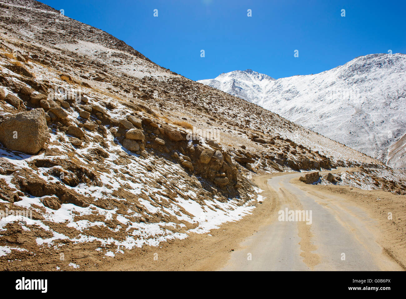 Road in himalayas with mountains Stock Photo - Alamy