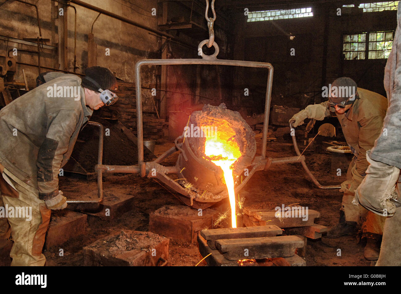 Melted gold smelter hi-res stock photography and images - Alamy