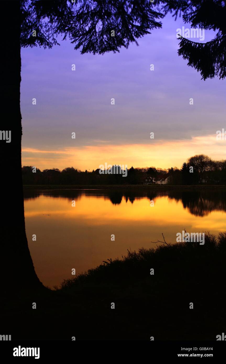 The lake in the evening with sundown Stock Photo - Alamy