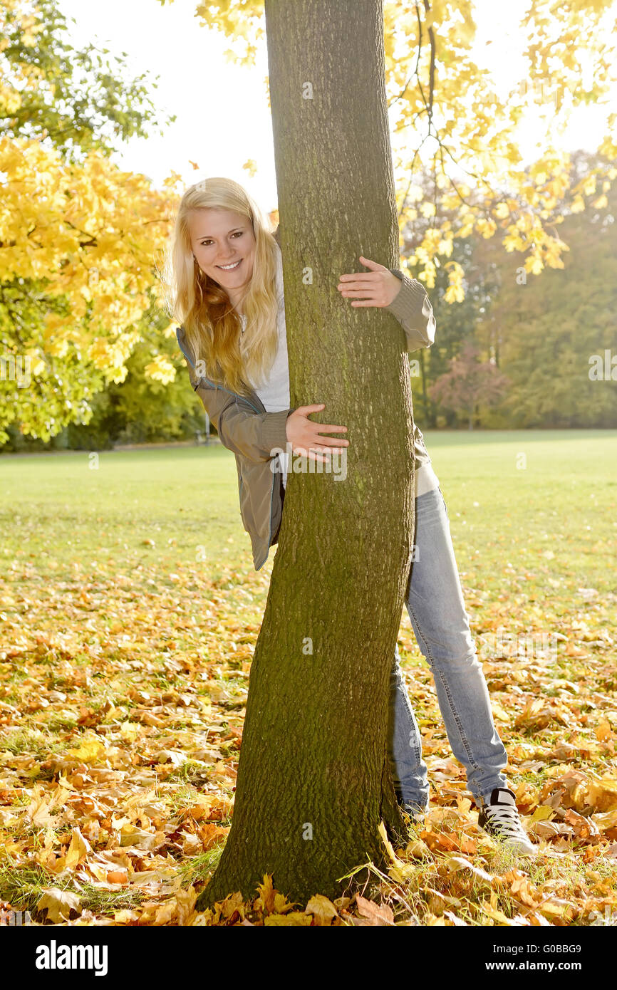 woman hugging a tree Stock Photo - Alamy