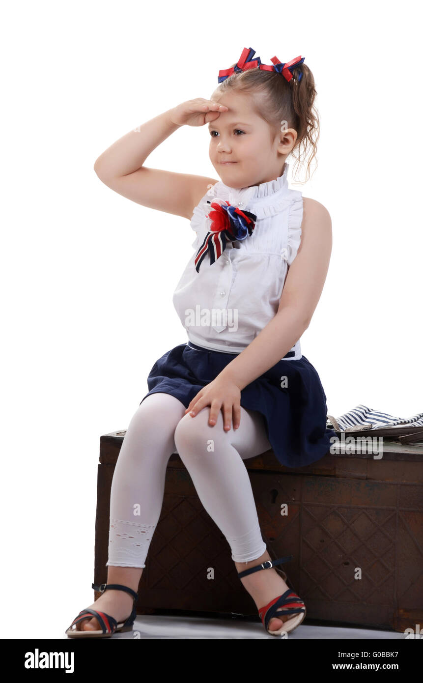 beautiful young female child model sitting on a chest Stock Photo - Alamy