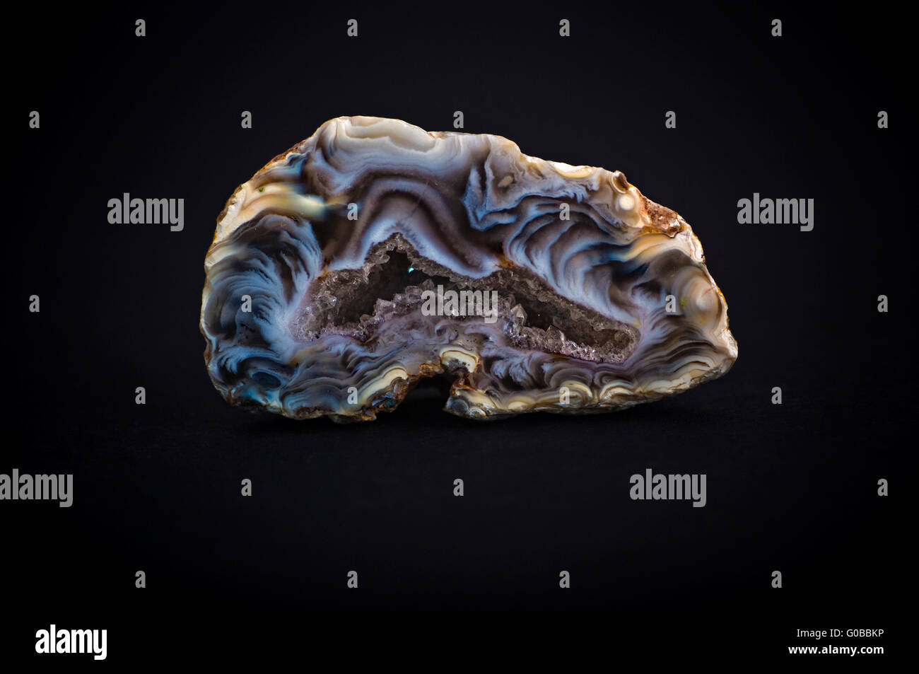 Agate gem stone with crystals Stock Photo - Alamy