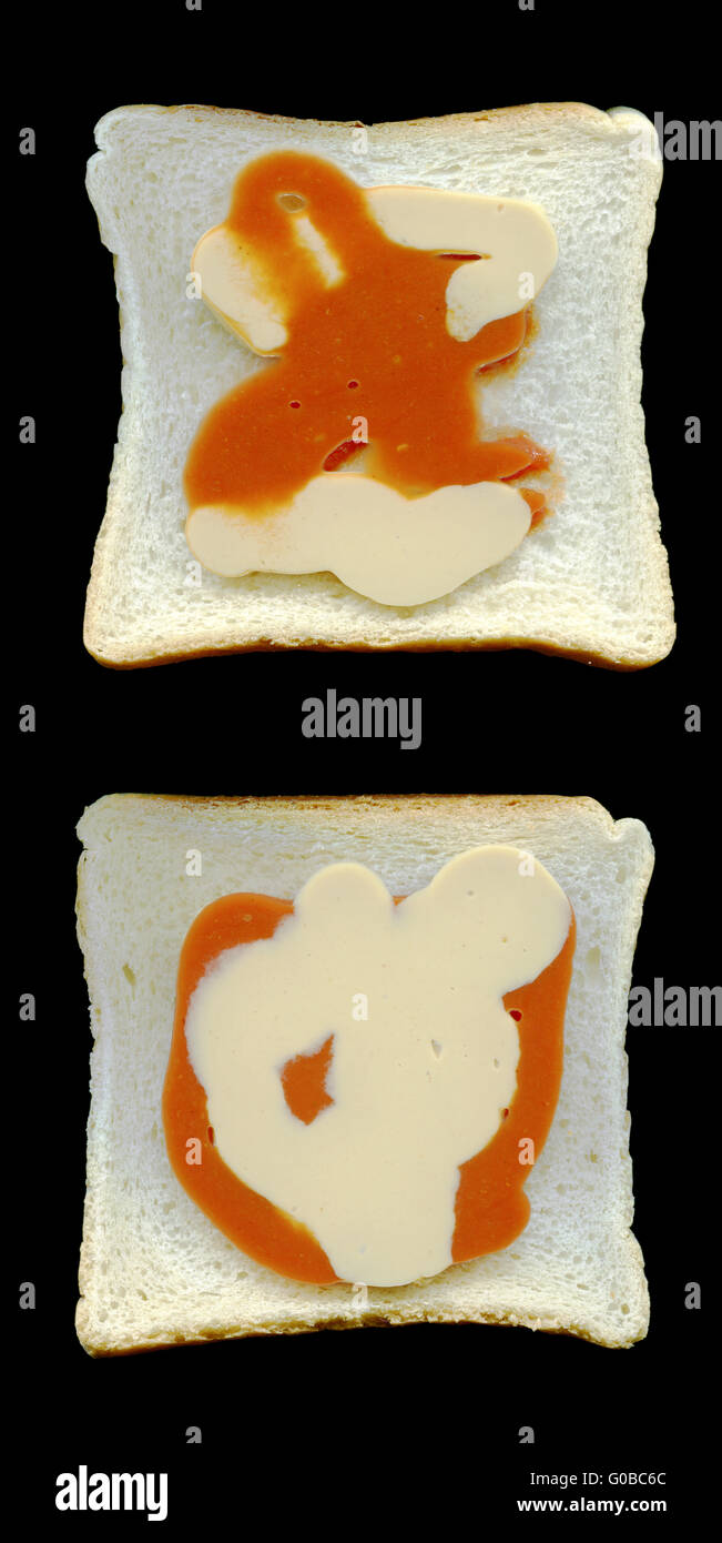 two slices of toast with mustard and ketchup Stock Photo - Alamy