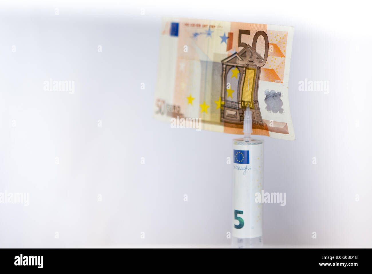 Money injection hi-res stock photography and images - Alamy