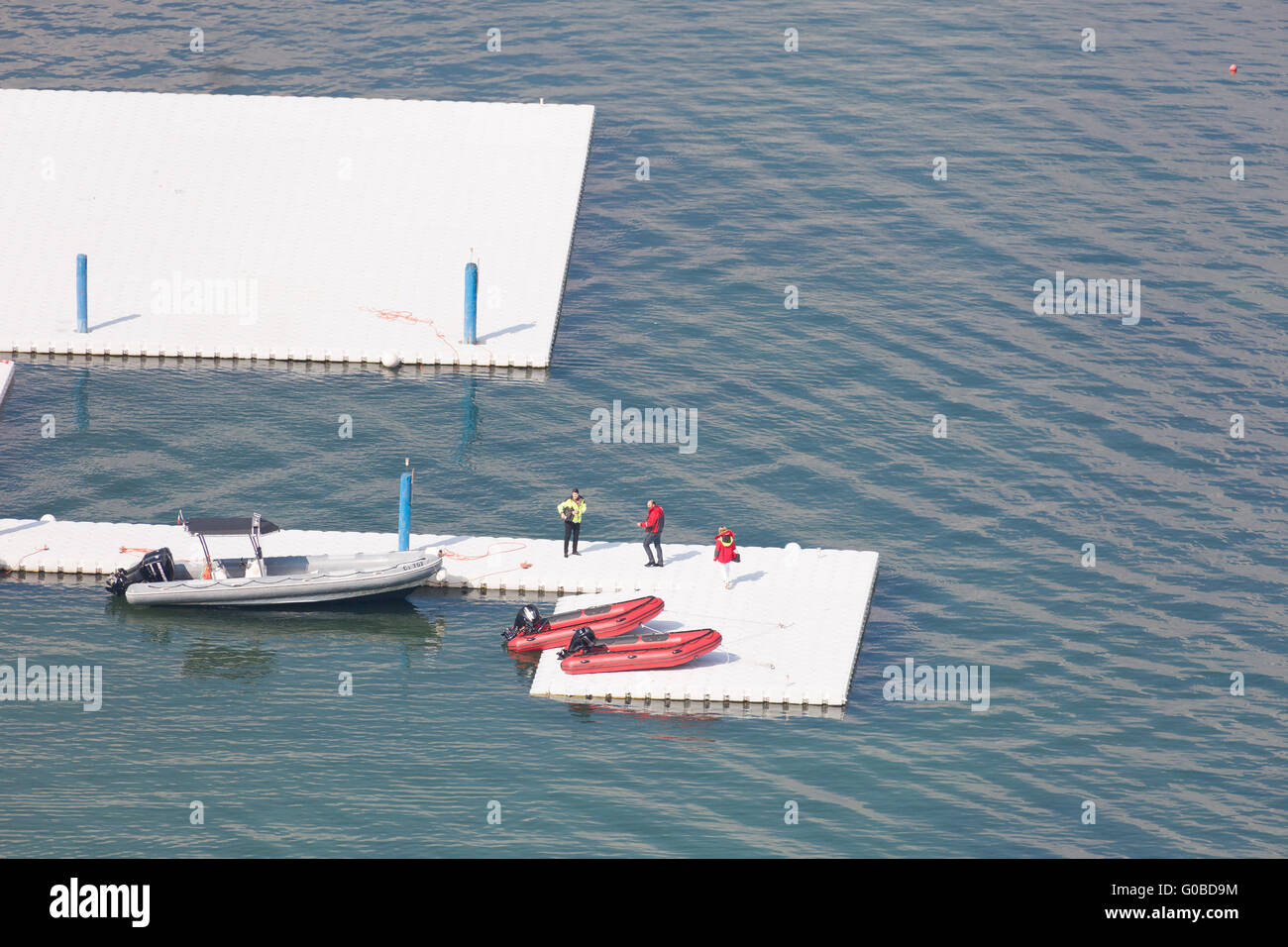 Construction of 'The Floating Piers' art piece by Christo and Jeanne ...