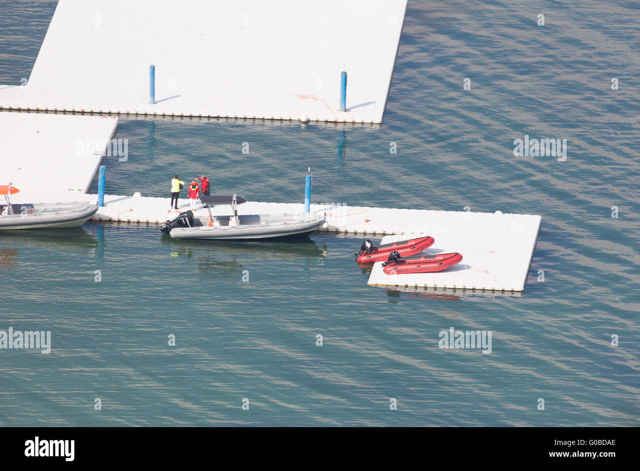 Construction of 'The Floating Piers' art piece by Christo and Jeanne ...