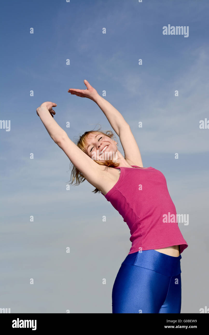 young woman cheering Stock Photo - Alamy