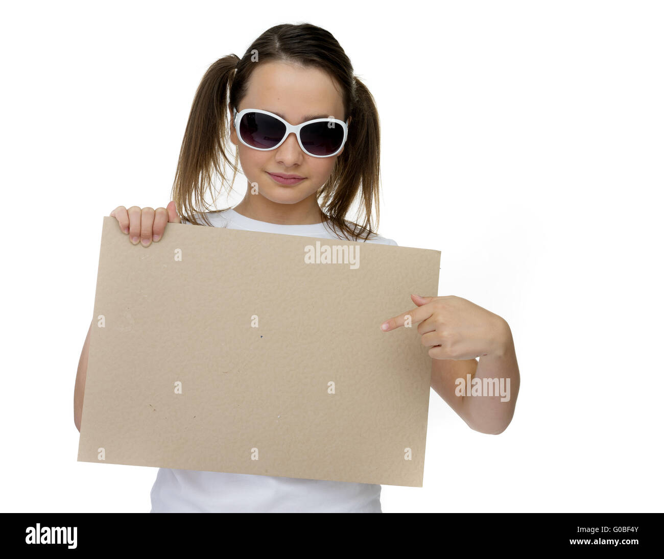 Trendy young girl pointing to a blank card Stock Photo - Alamy