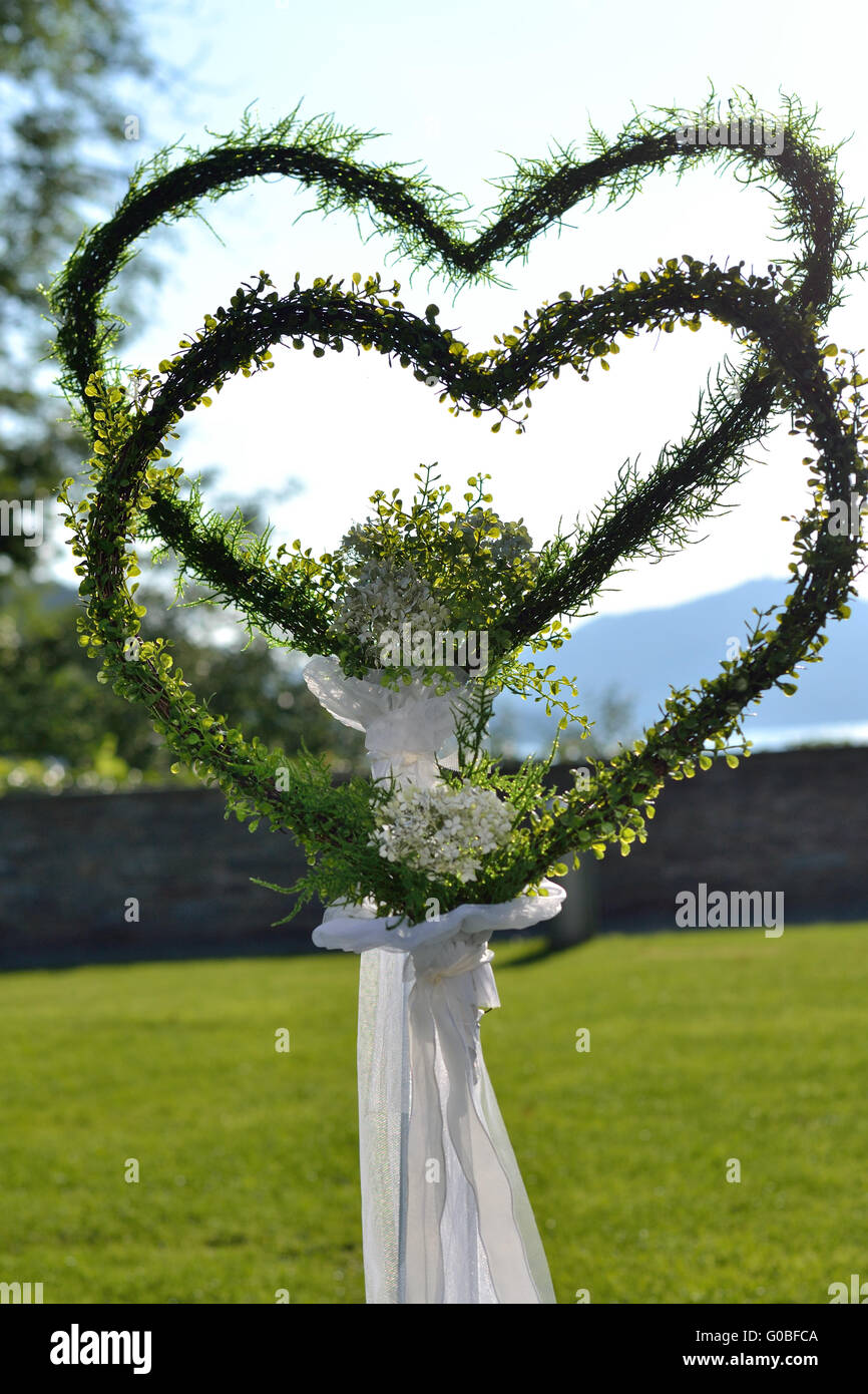 Flower arrangement in the form of two hearts Stock Photo - Alamy
