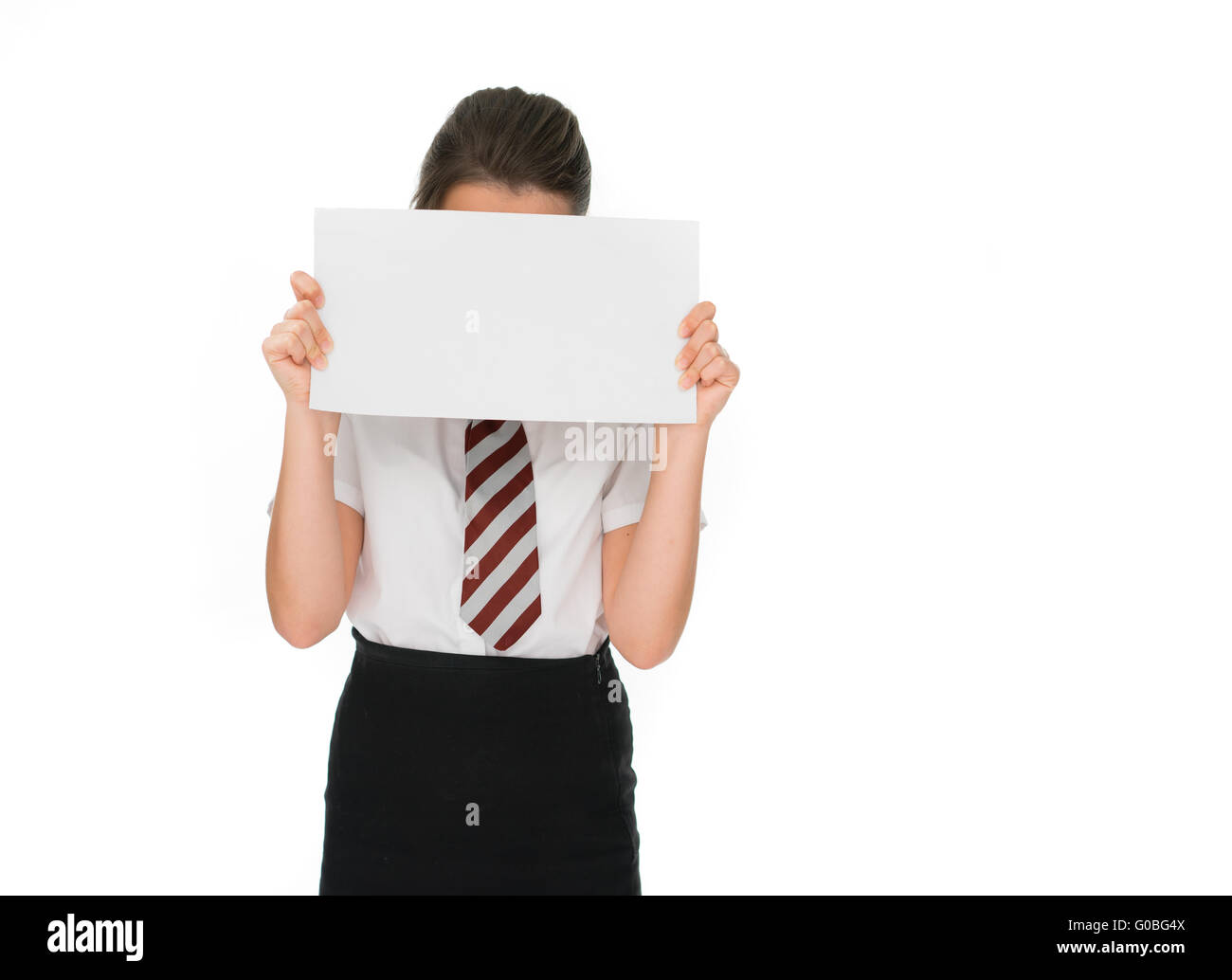 Teenager school uniform hiding face hi-res stock photography and images ...