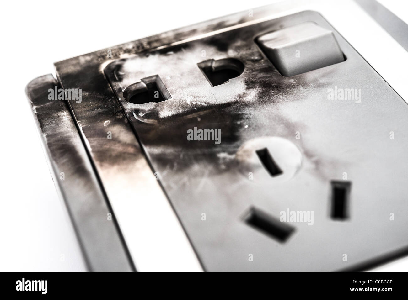burnt out electric socket close up on a white background Stock Photo ...