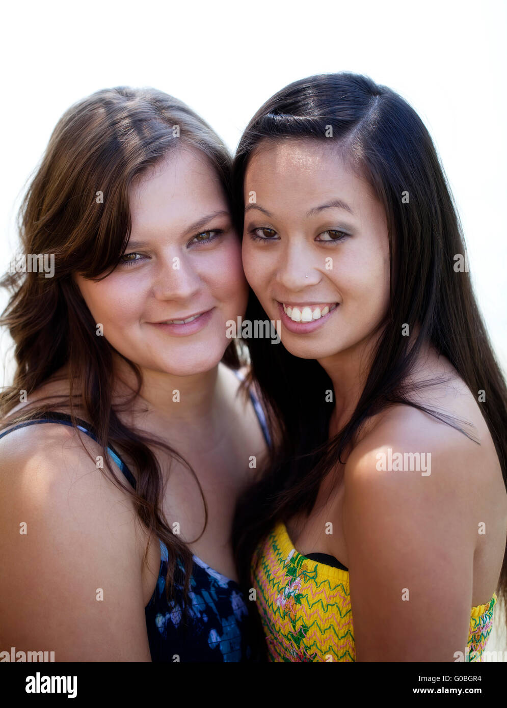 Two Women Close Standing Close Together Touching Stock Photo - Alamy