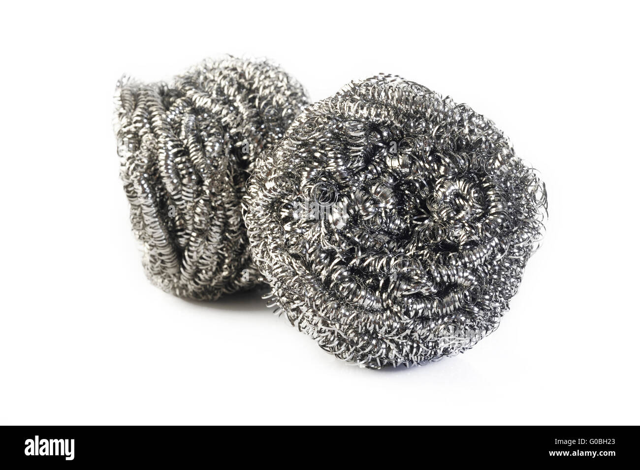 stainless steel scourer on white background Stock Photo - Alamy