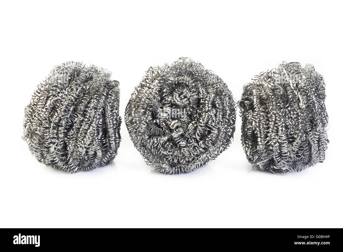 stainless steel scourer on white background Stock Photo - Alamy