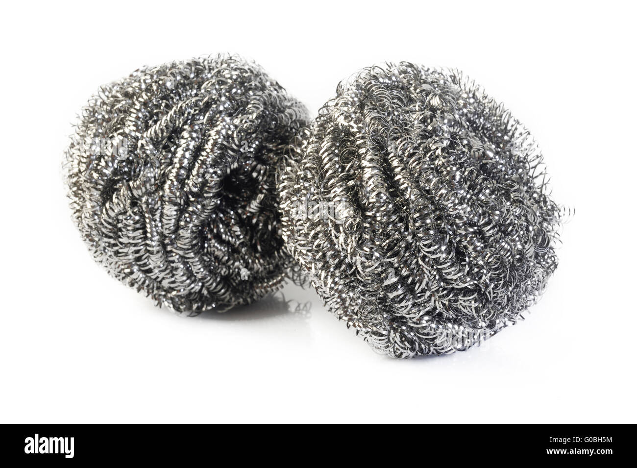 stainless steel scourer on white Stock Photo - Alamy