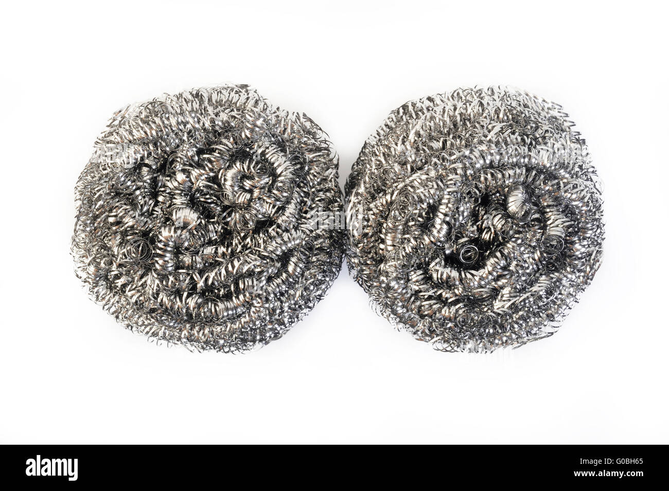 stainless steel scourer on white background Stock Photo - Alamy