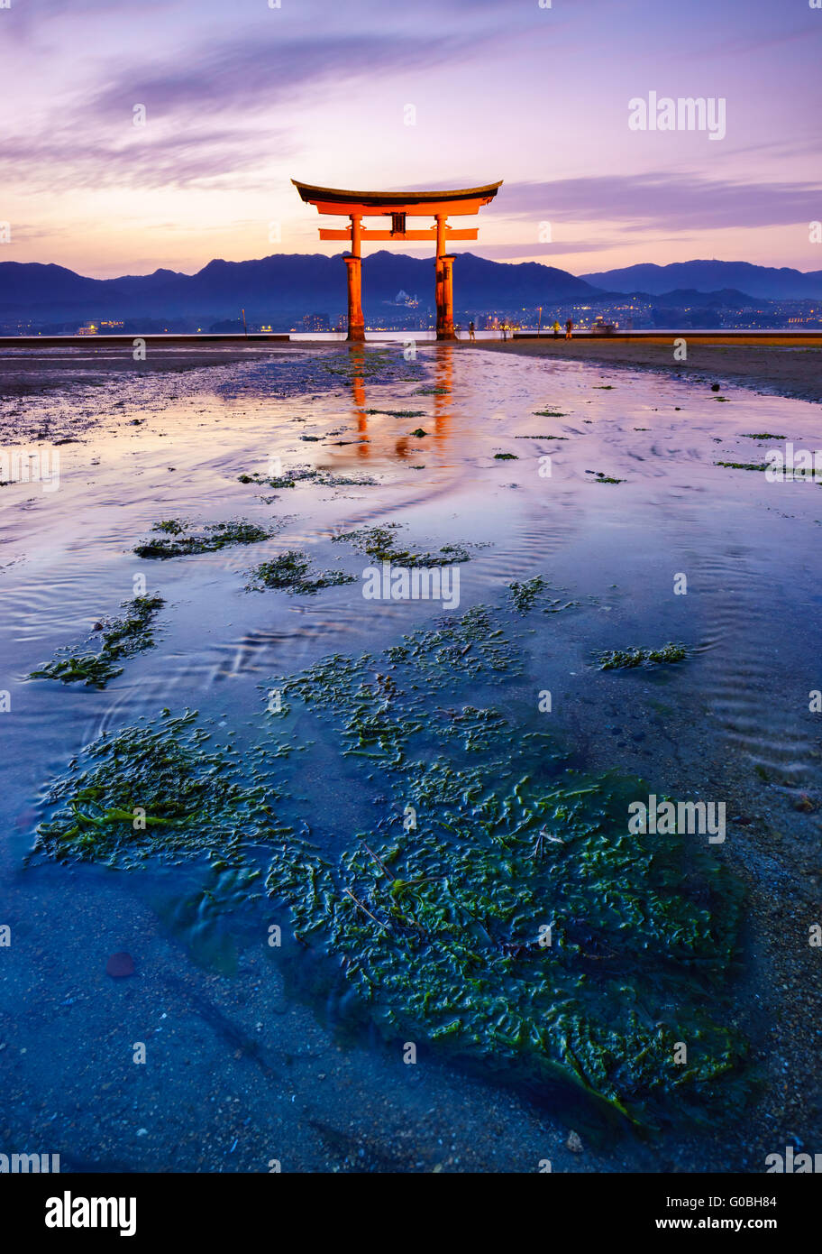 The floating Torii Gate at sunset, Miyajima island, Hiroshima, Japan ...