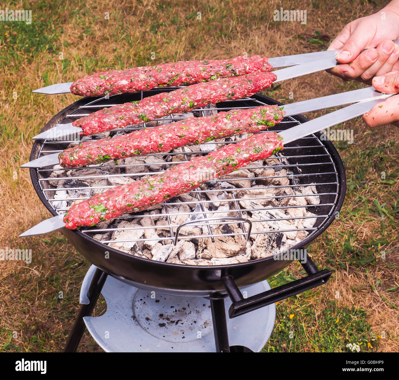 Round bbq grill hi-res stock photography and images - Alamy