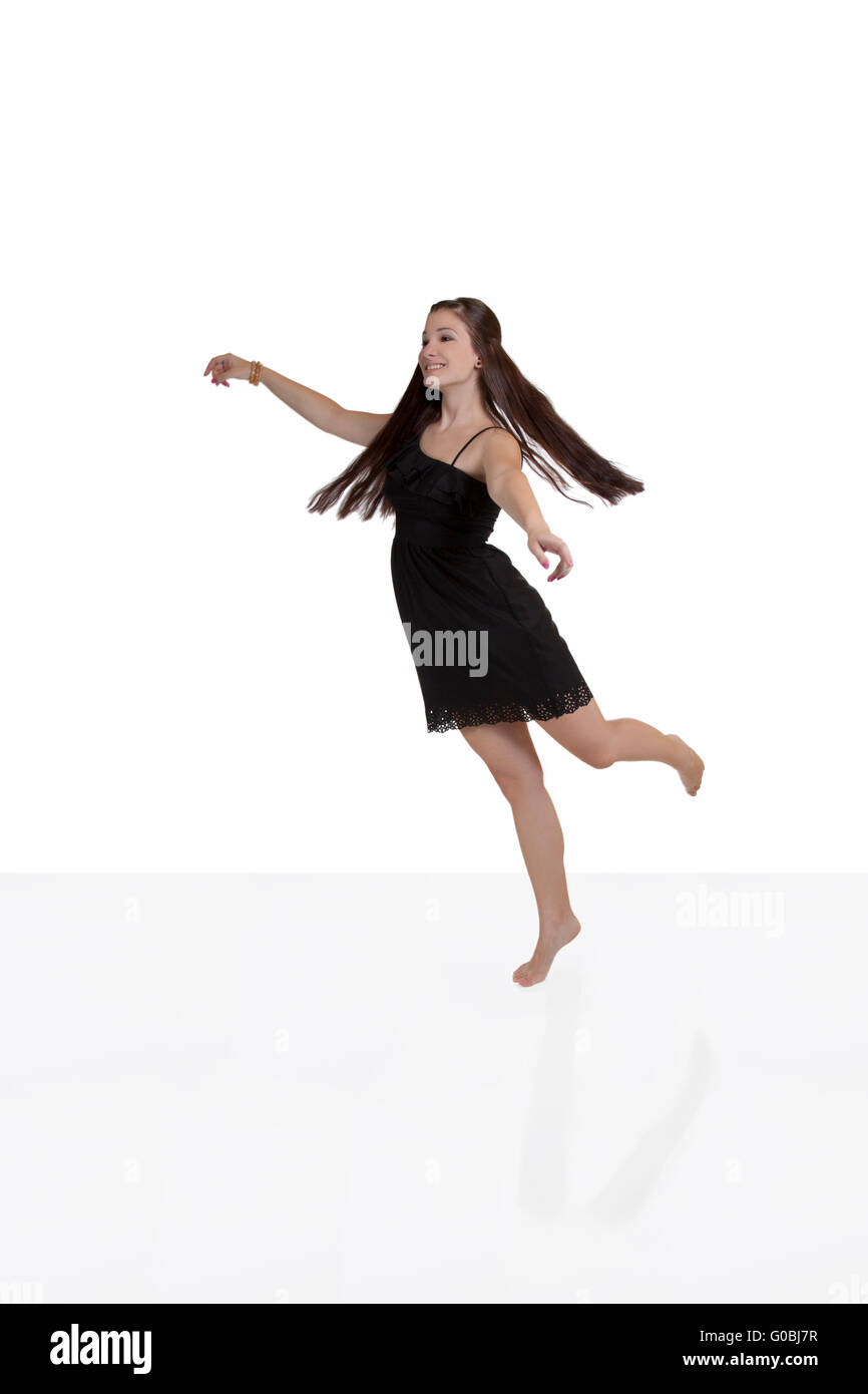 Young Teen Girl Spinning on One Leg Stock Photo - Alamy