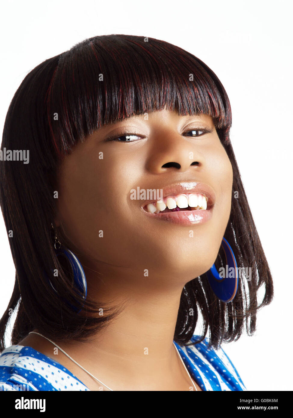 Young Black woman with big smile head tilted back Stock Photo - Alamy
