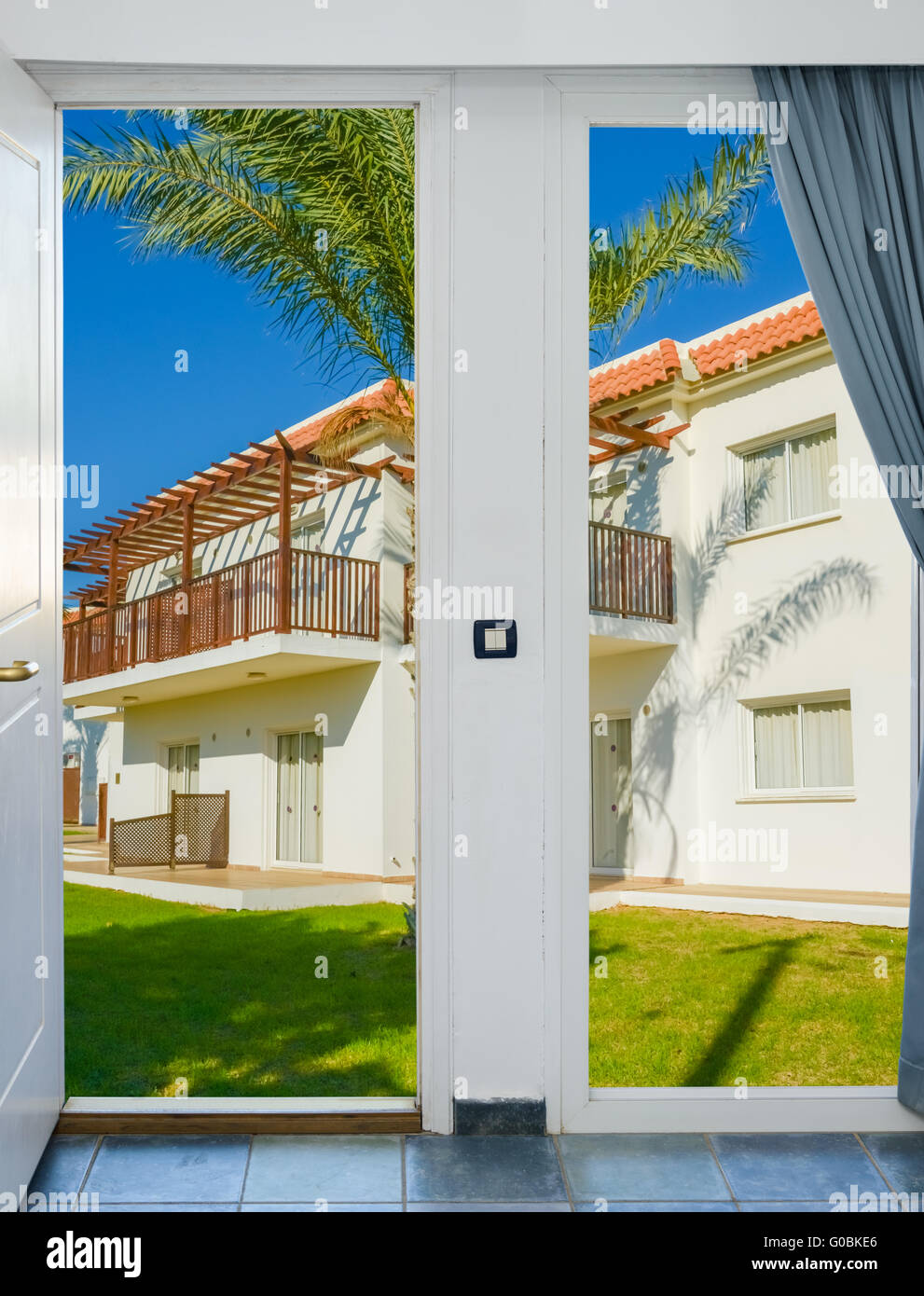 nature landscape with a view through a window with curtains Stock Photo ...
