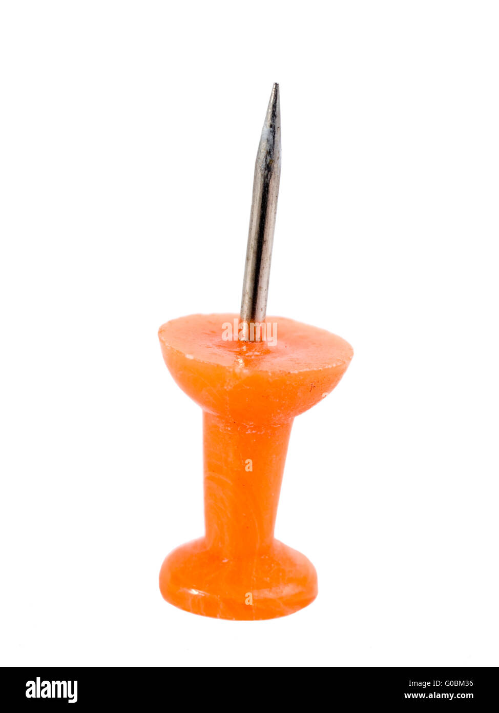 orange push pin standing with needle end up closeup Stock Photo - Alamy