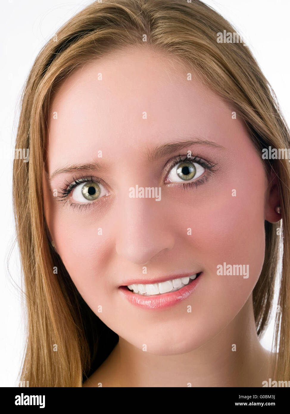 Portrait young blond woman smiling green eyes Stock Photo - Alamy
