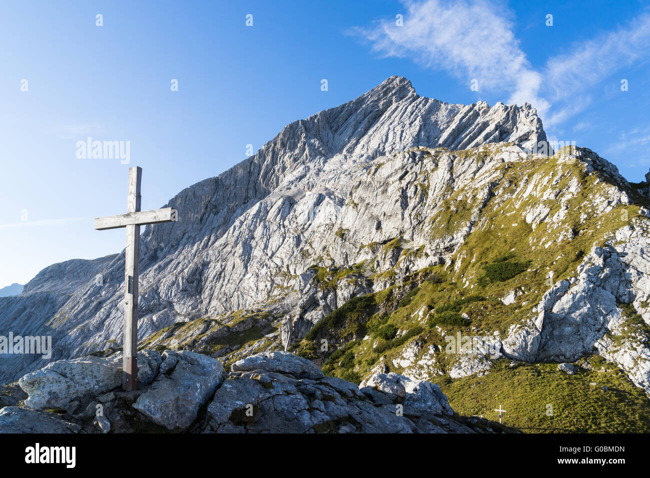 Summit cross and Mt. Alpspitze Stock Photo - Alamy