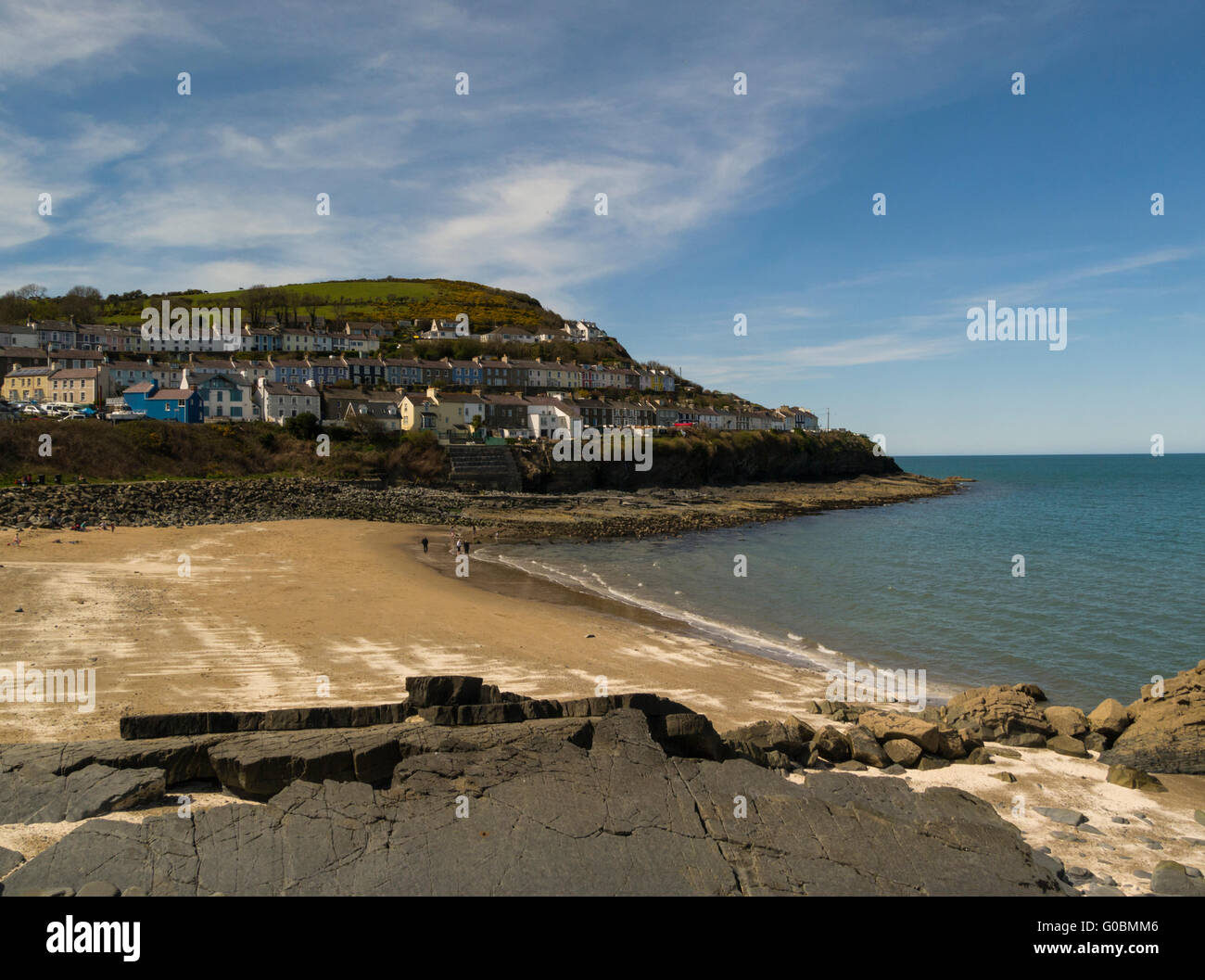 Looking across the golden sands of New Quay beach Ceredigion Mid Wales ...