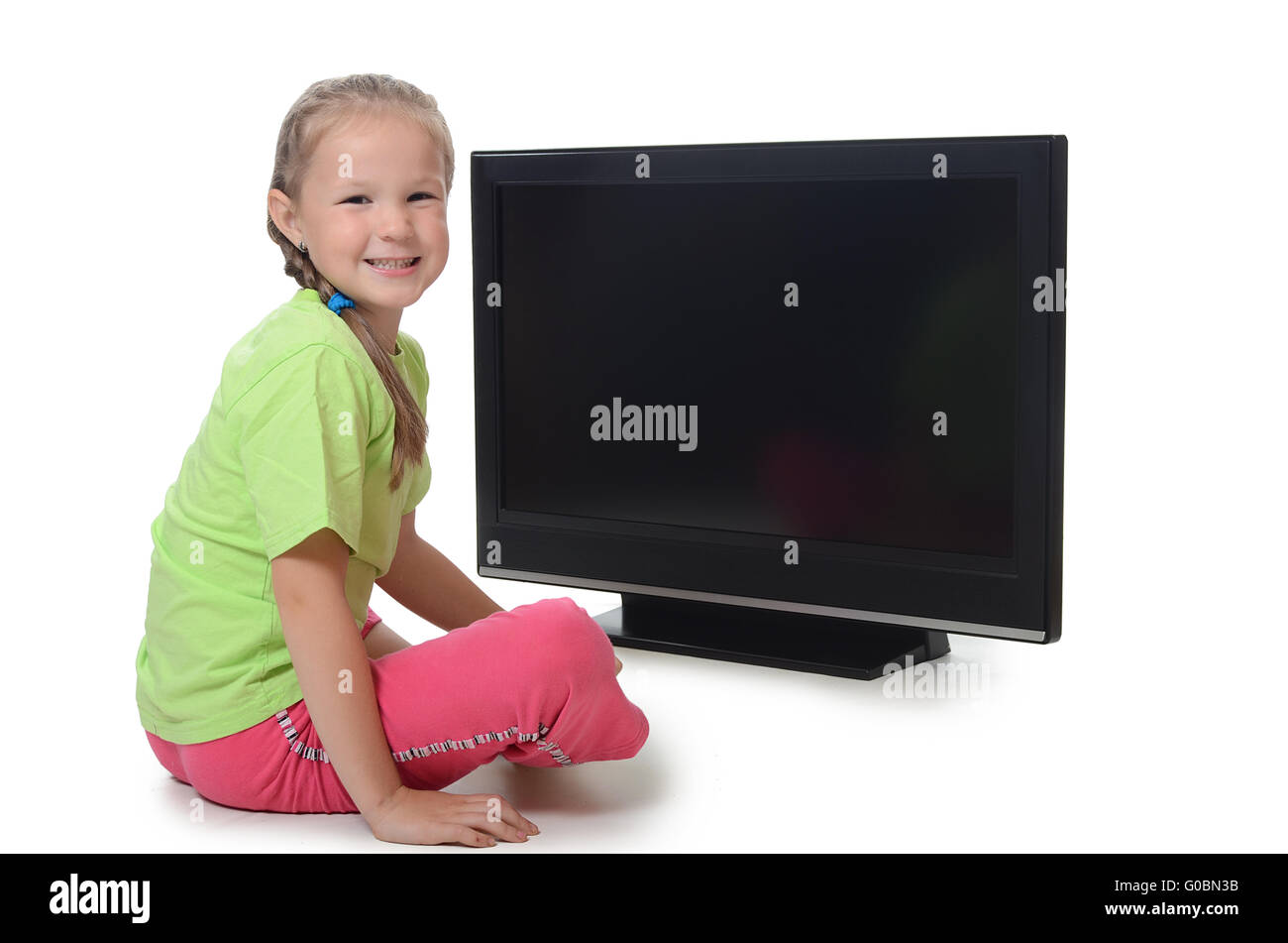 The little girl looks lsd tv Stock Photo - Alamy