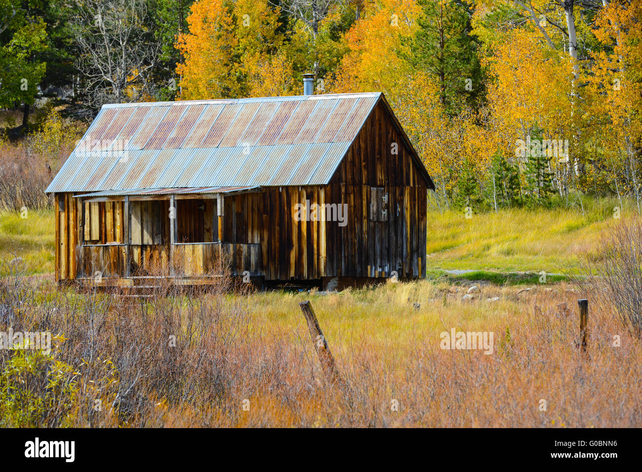 Log Cabin in the Mountains during Fall or Autumn Stock Photo - Alamy