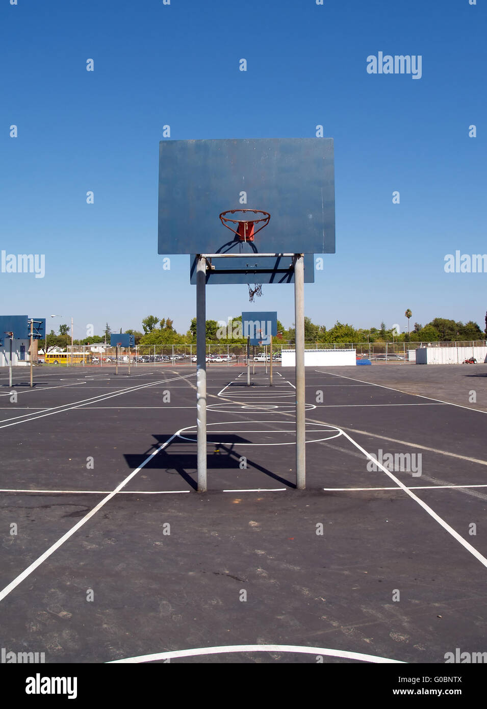 outside basketball courts with footprints and parking lot Stock Photo ...