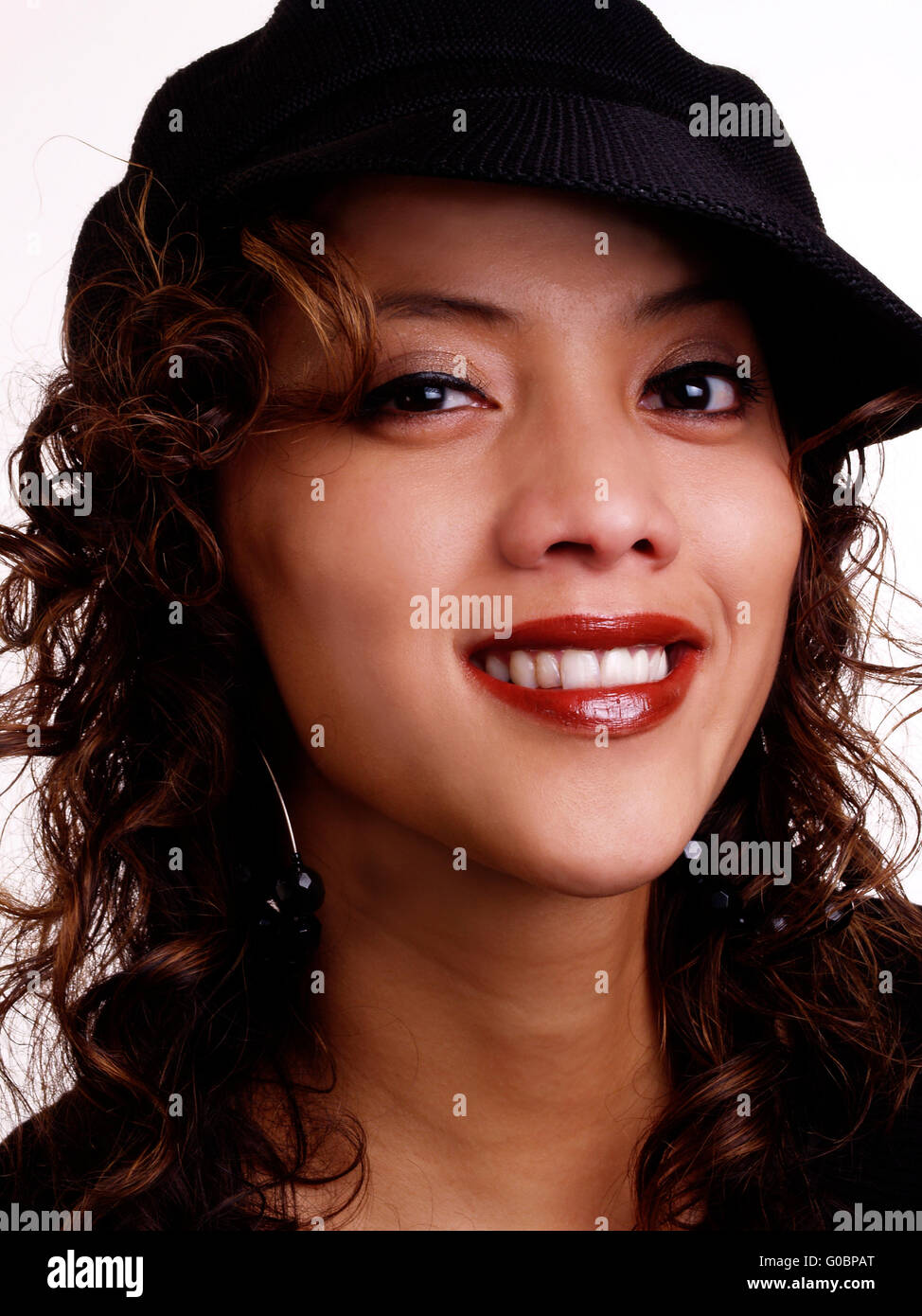 Attractive Smiling Filipino Hispanic Woman Portrait Hat Stock Photo - Alamy