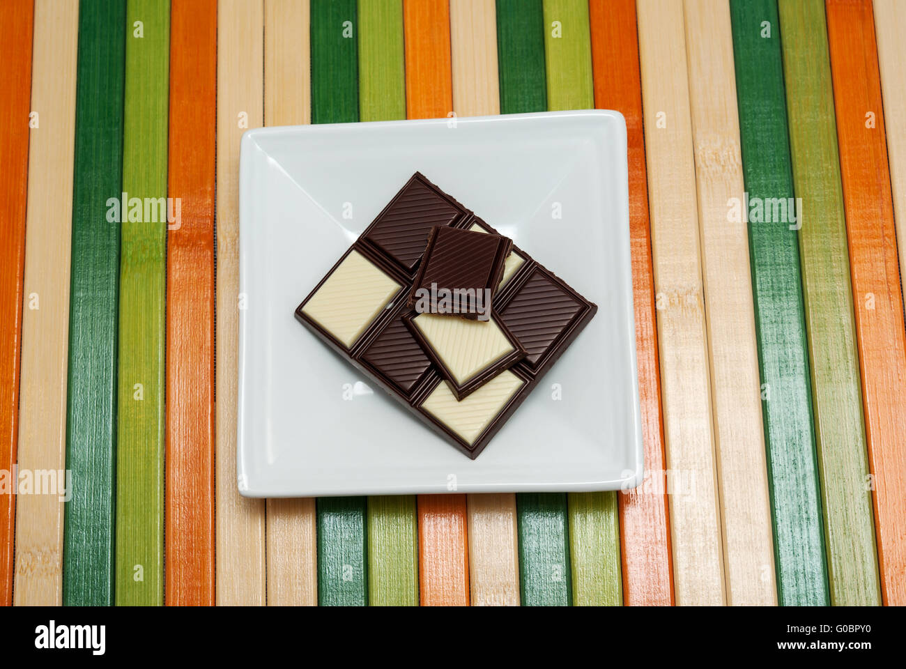 A square plate with white and dark chocolate Stock Photo - Alamy