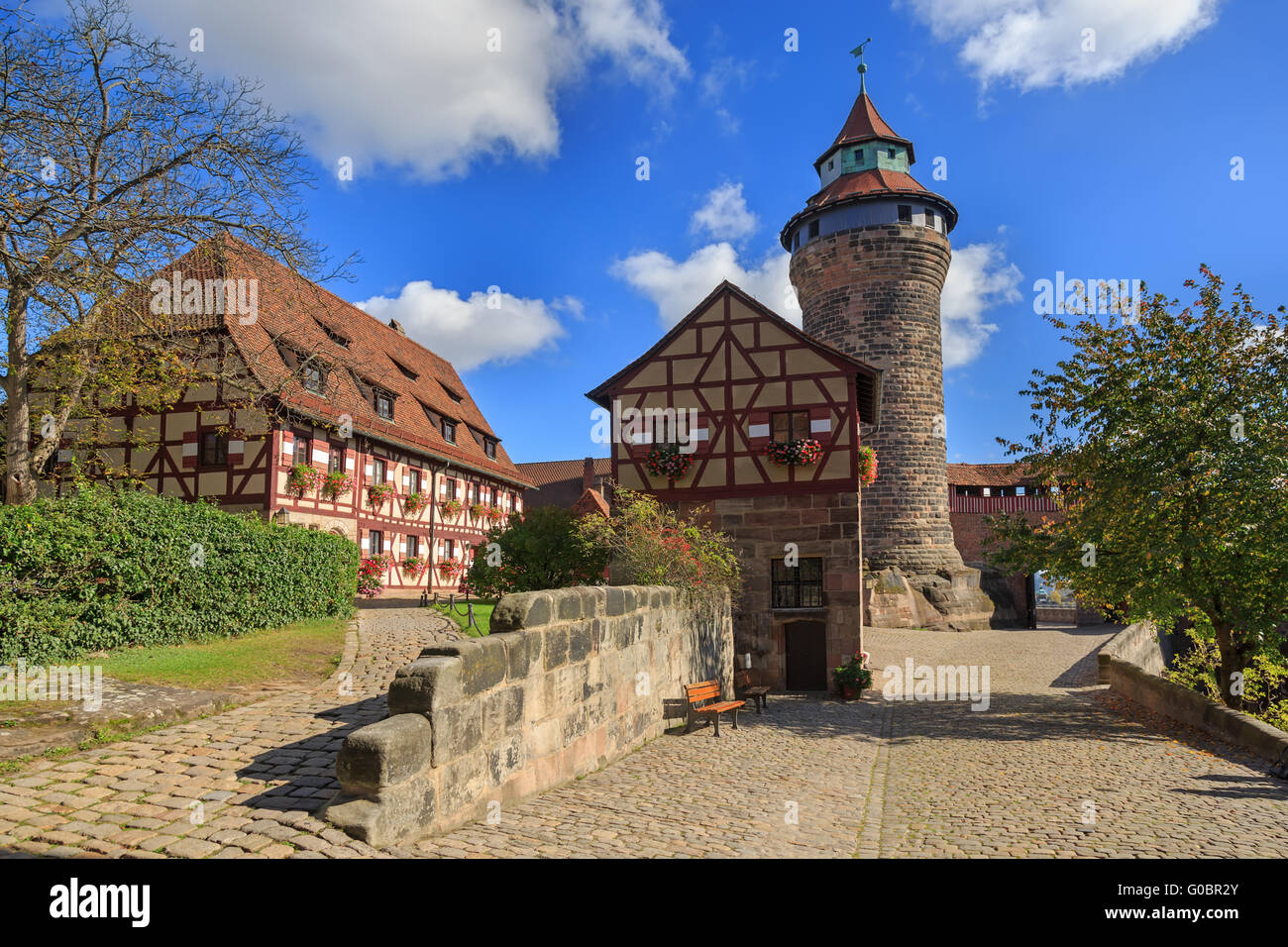 Nuremberg Castle (Sinwell tower) with blue sky and clouds Stock Photo ...