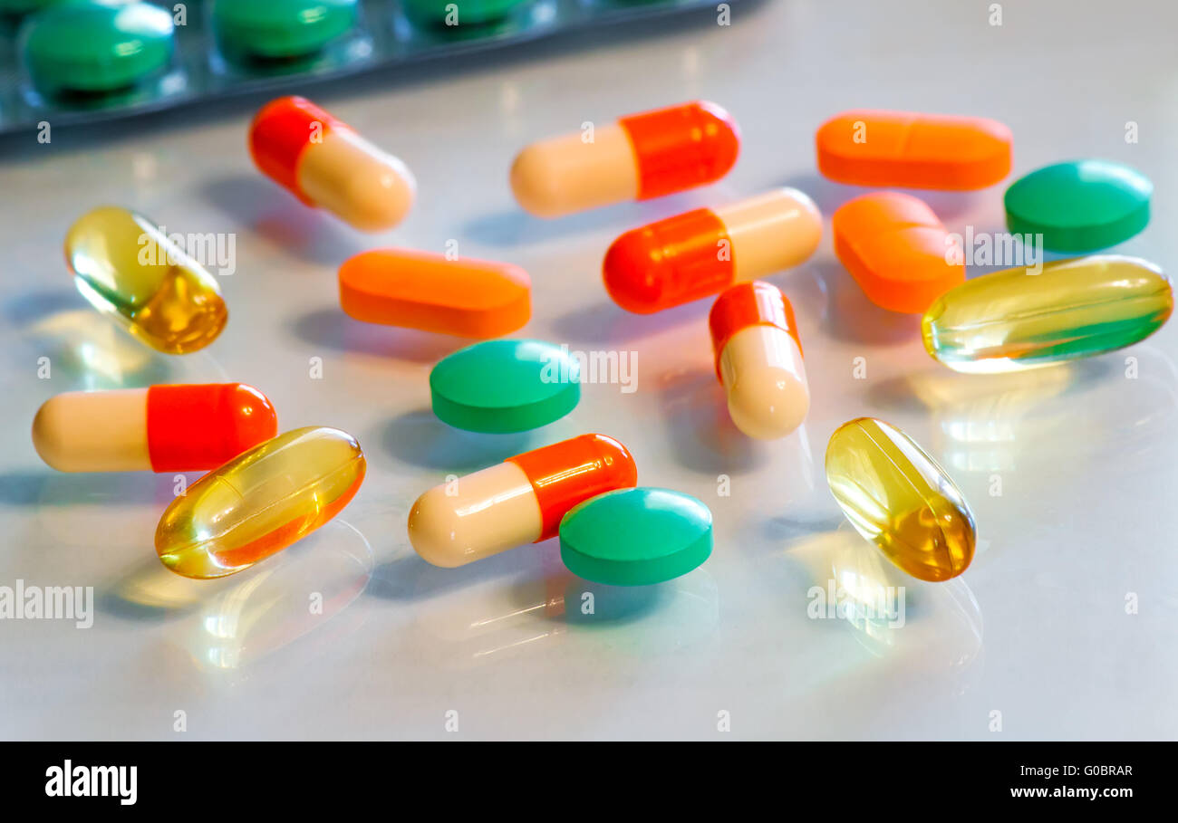 Drugs: tablets and capsules Stock Photo - Alamy