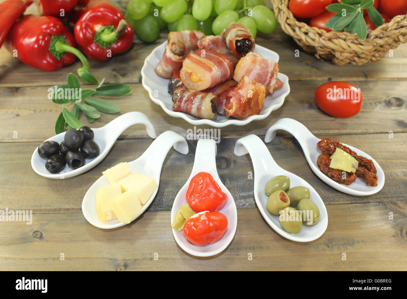 stuffed Tapas with fruits and bacon Stock Photo - Alamy