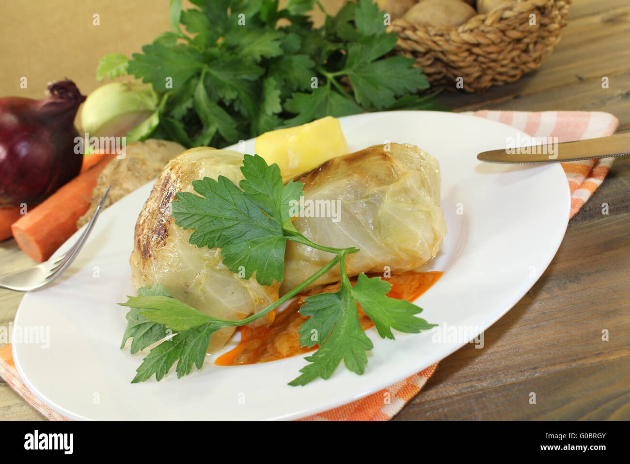 cabbage roulade with potatoes and parsley Stock Photo - Alamy