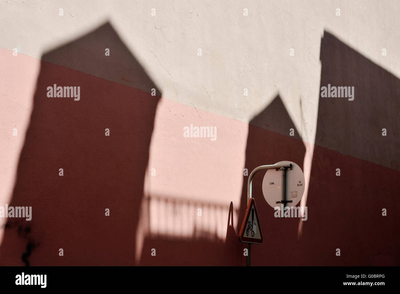 Shadow and traffic sign Stock Photo - Alamy