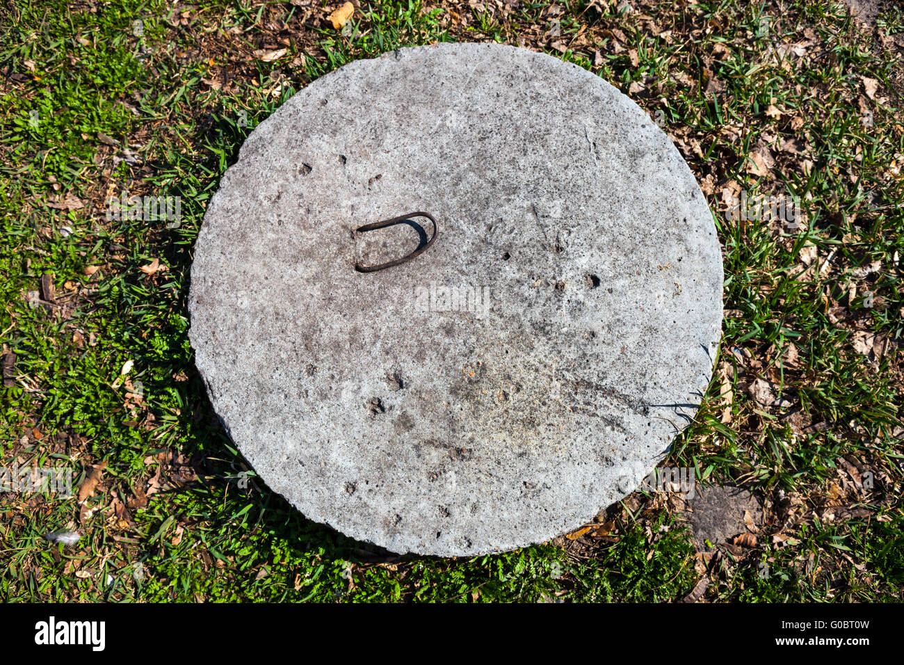 Concrete manhole cover hi-res stock photography and images - Alamy