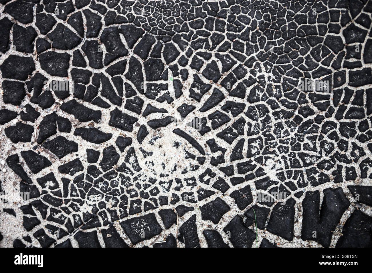 The surface texture with cracked black tar Stock Photo - Alamy