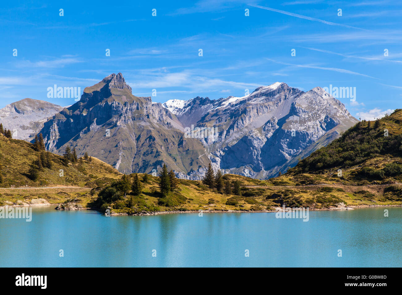 Stunning view of Truebsee (lake) with the peak Hahnen and Wissberg of ...