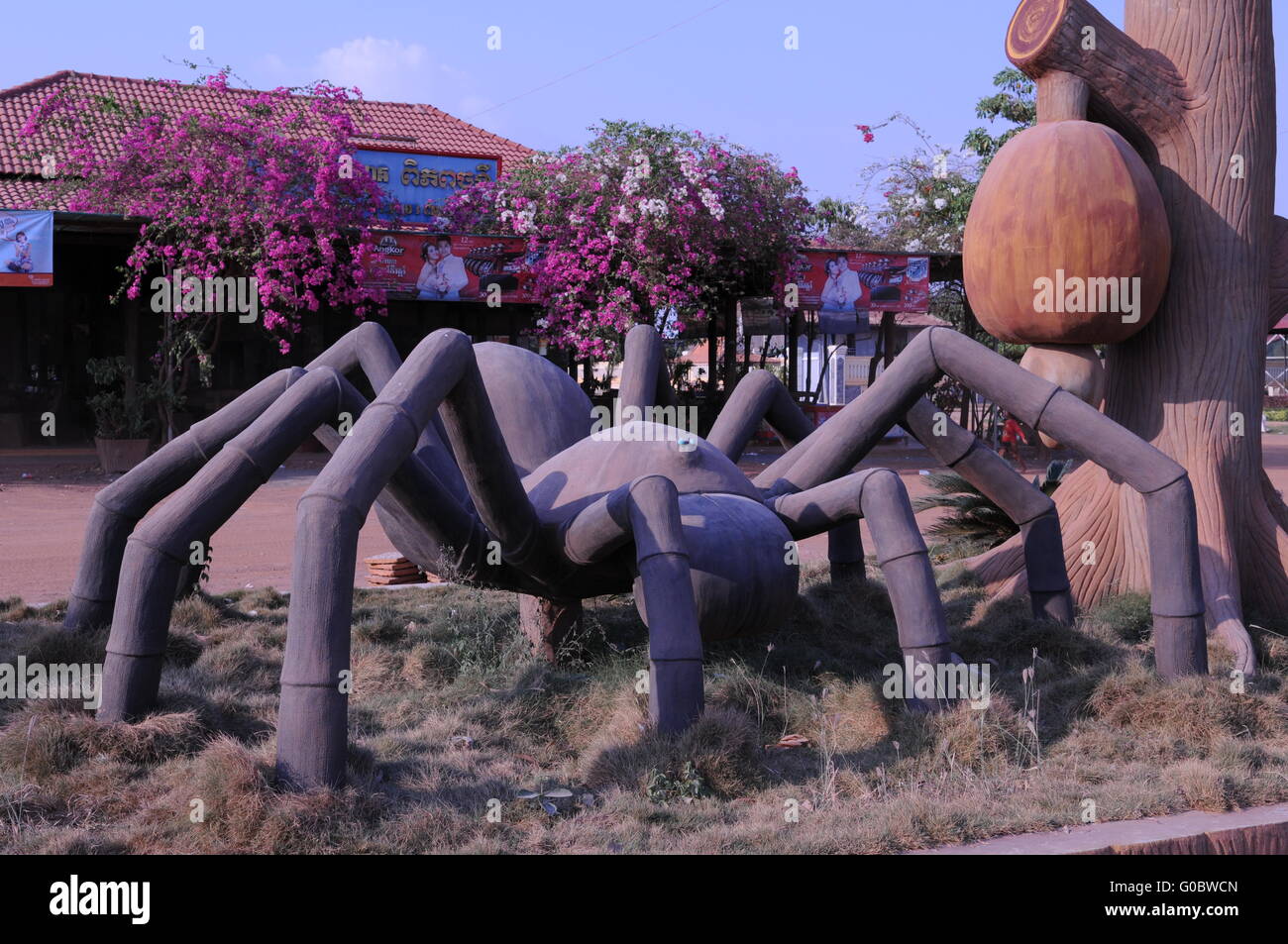 Spider & cashew nut statues, Fried spider is a regional delicacy in ...