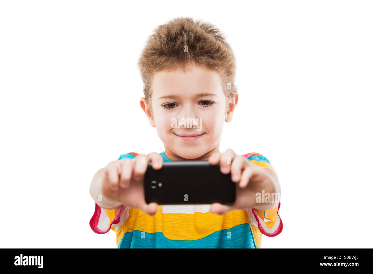 Smiling child boy holding mobile phone or smartpho Stock Photo - Alamy