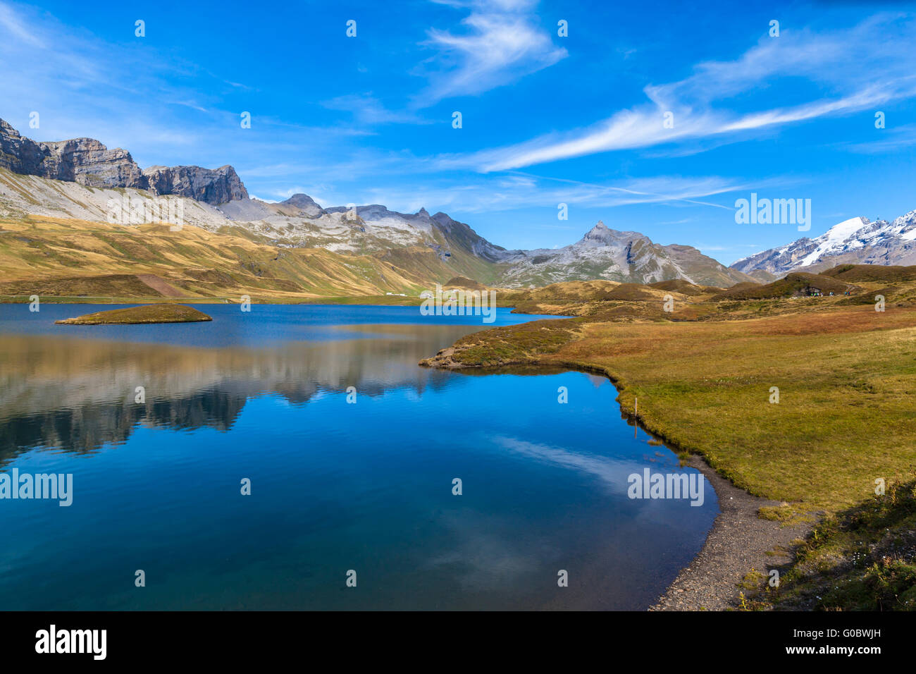 Stunning view of Tannensee with beautiful reflection of the mountain ...