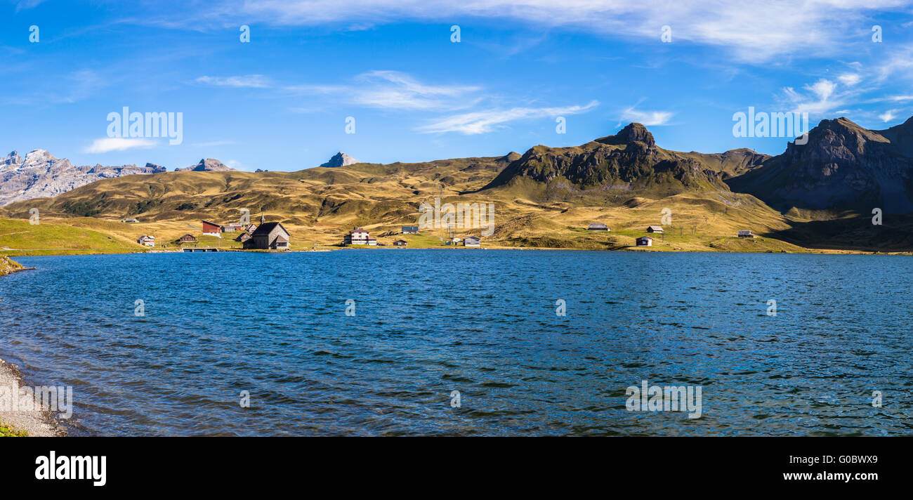 Panorama view of Melchsee lake and the mountain range of Titlis in ...