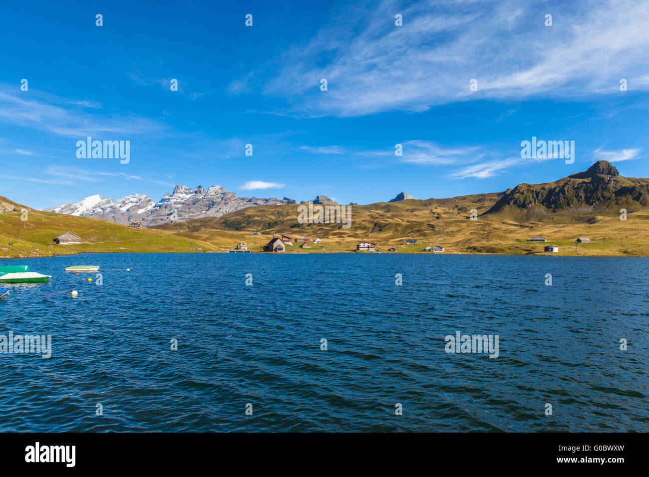Stunning view of Melchsee lake and the mountain range of Titlis in ...